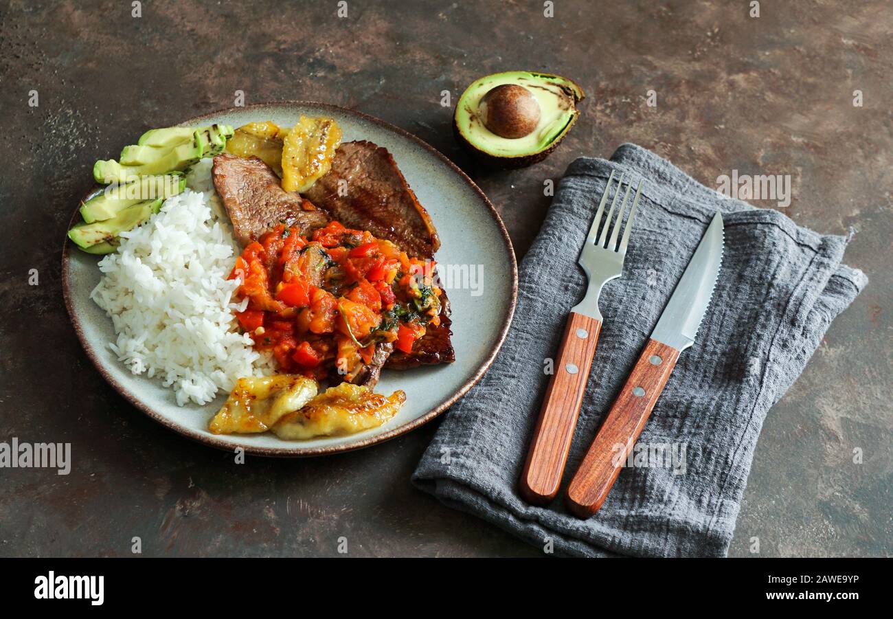 El Bistec a la Criolla - colombian dish traditional - beef steak with ...
