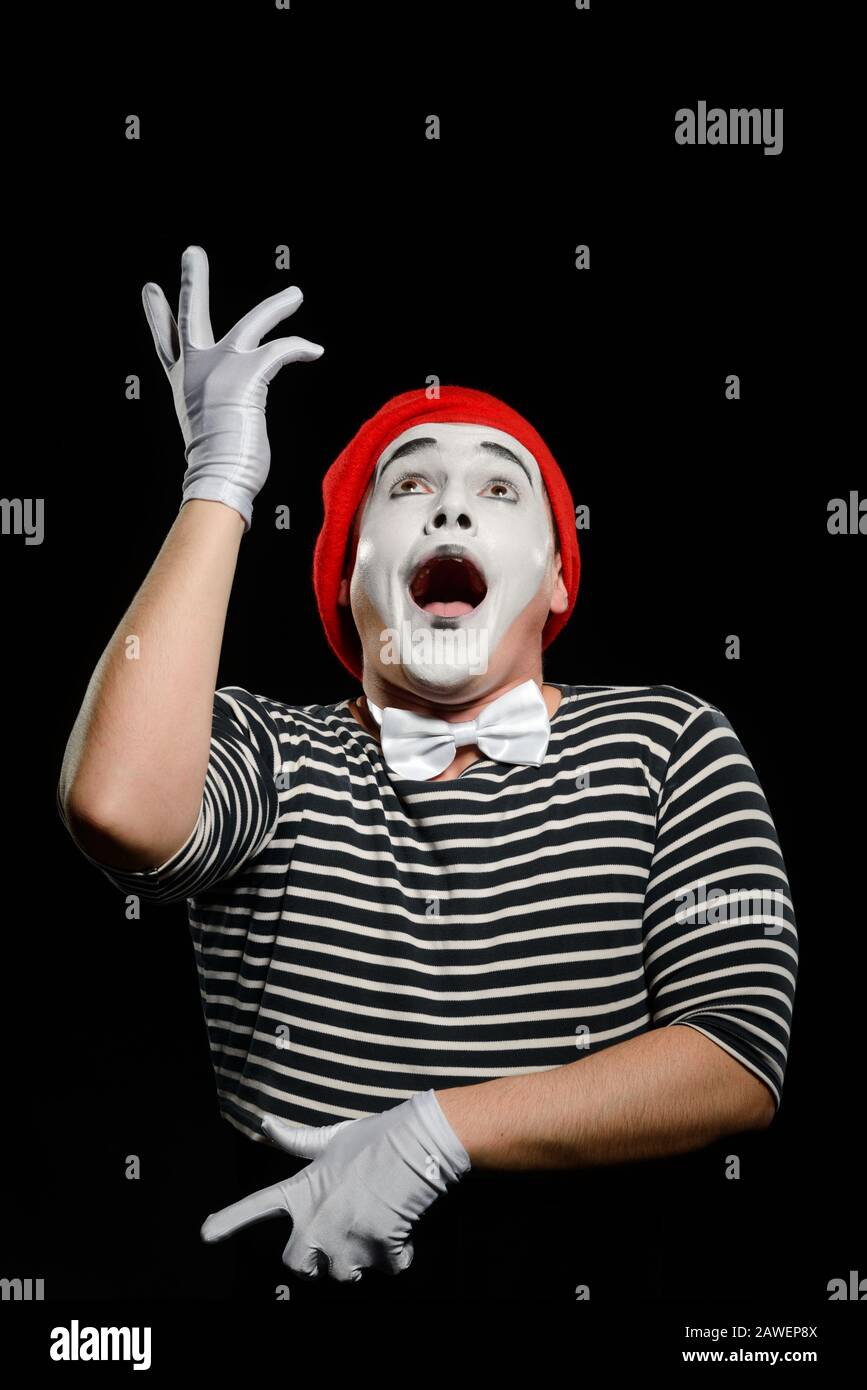 Male mime on black. Man, as a pantomime actor Stock Photo - Alamy