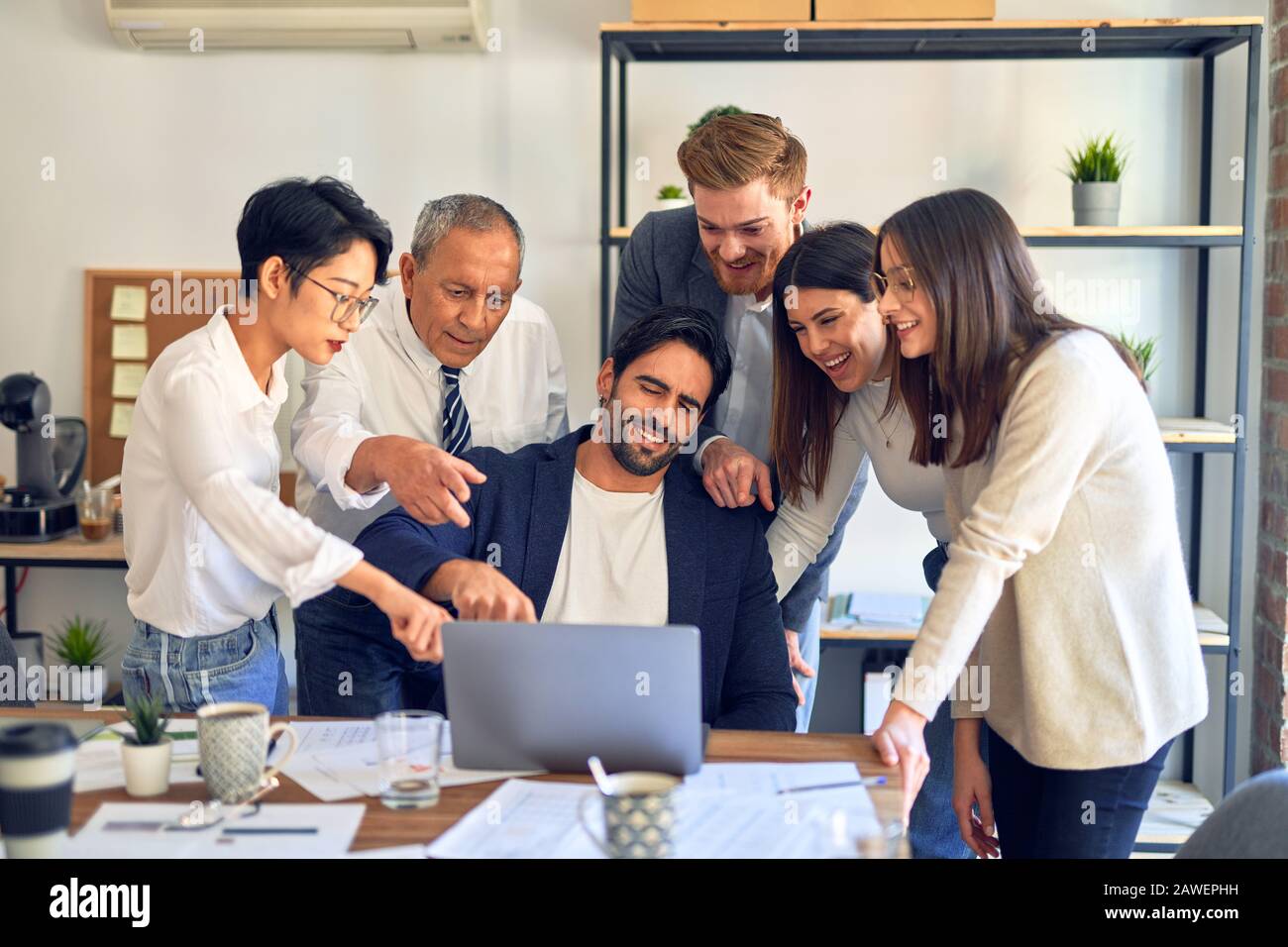 Group of business workers smiling happy and confident. One of them ...