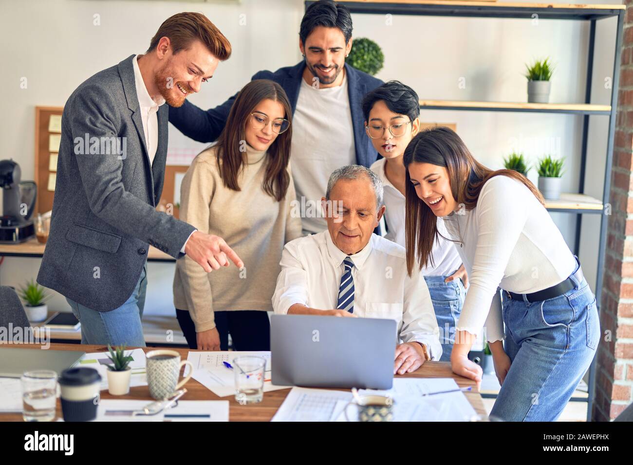 Group of business workers smiling happy and confident. One of them ...