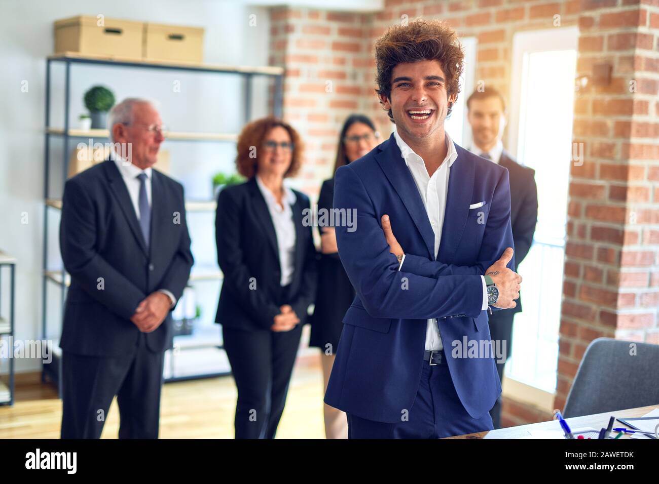 Group of business workers smiling happy and confident in a meeting ...