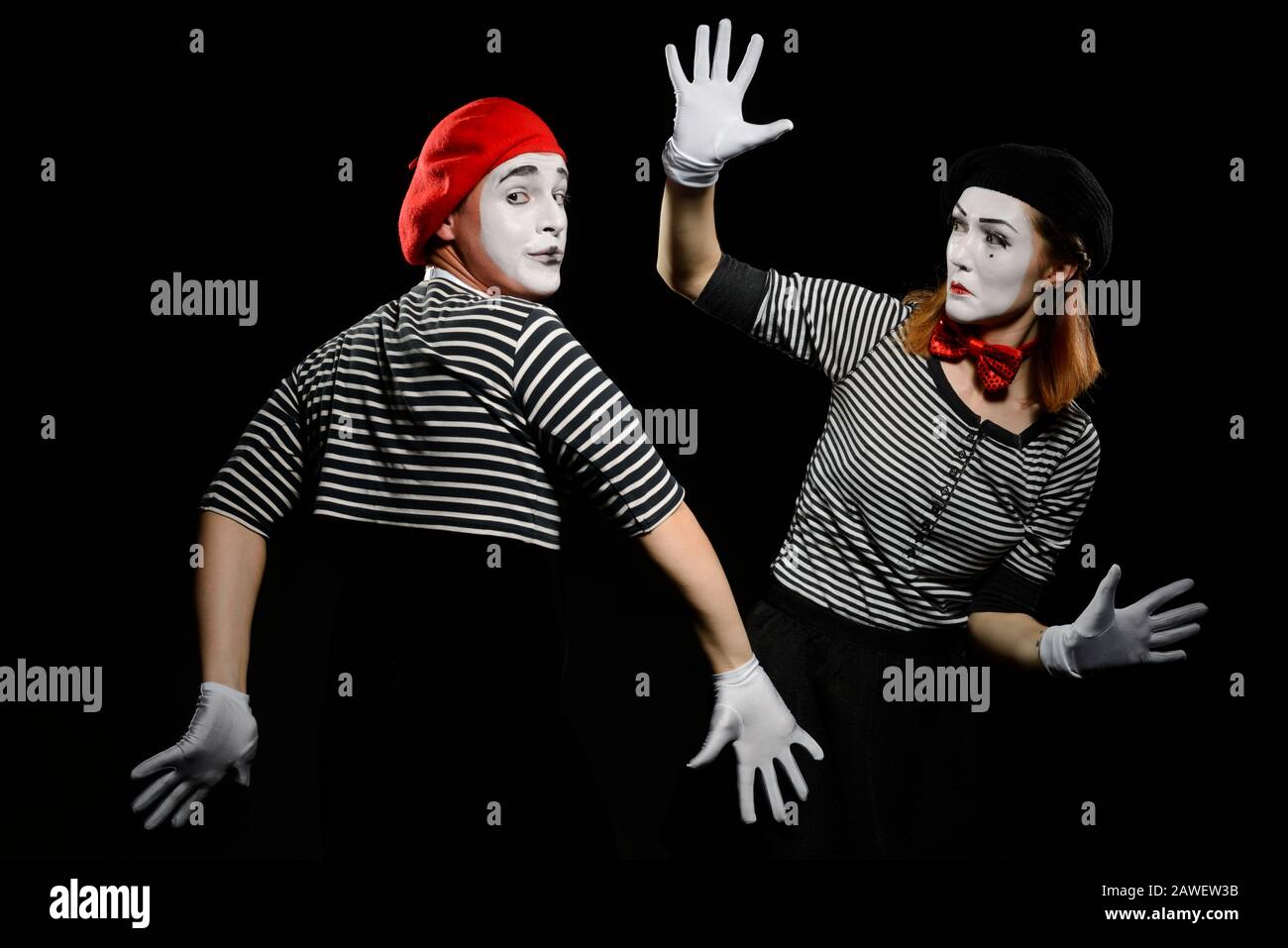 Two mimes and invisible wall. Pantomime show at circus Stock Photo - Alamy