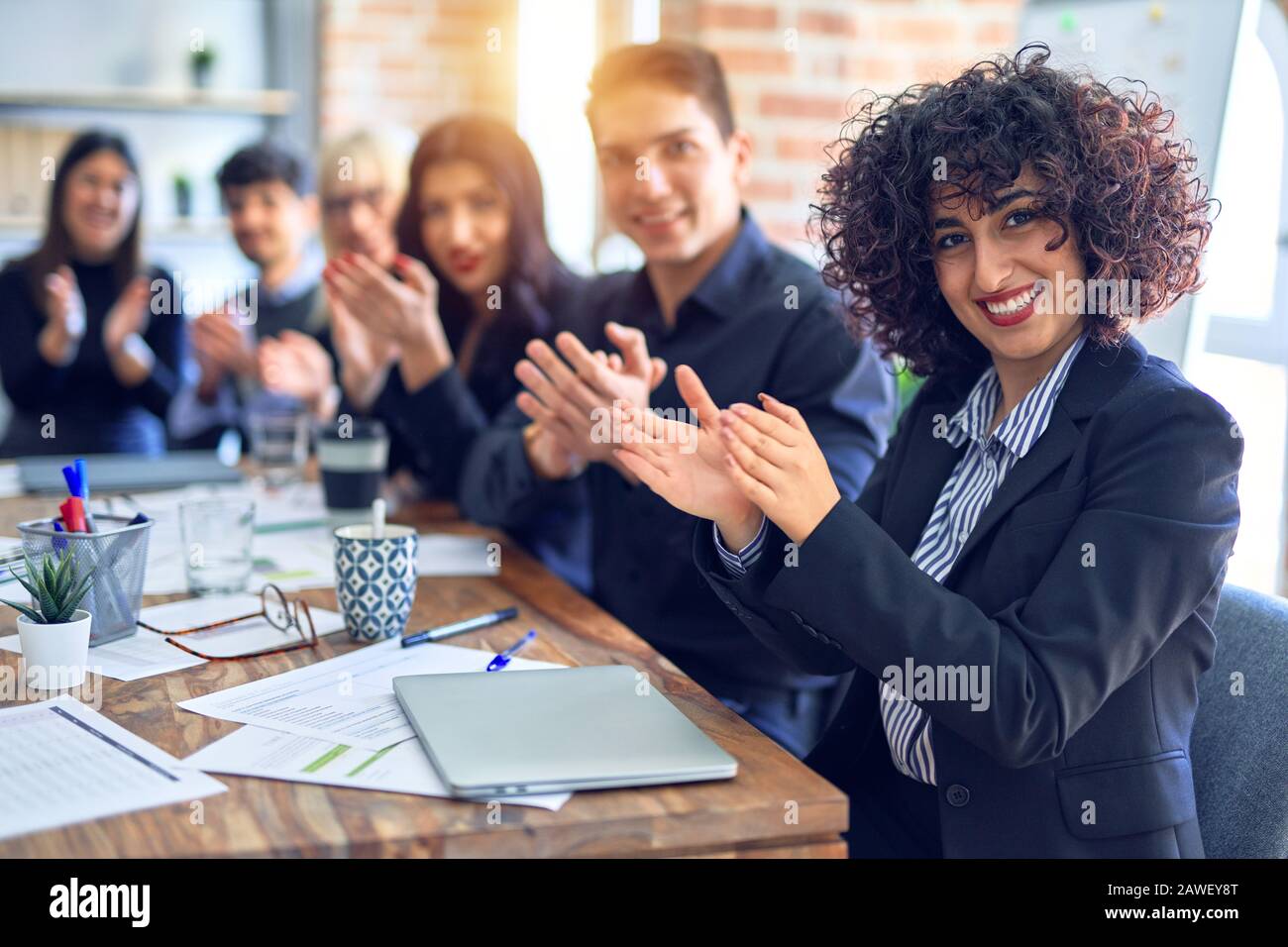 Group of business workers smiling happy and confident. Working together ...