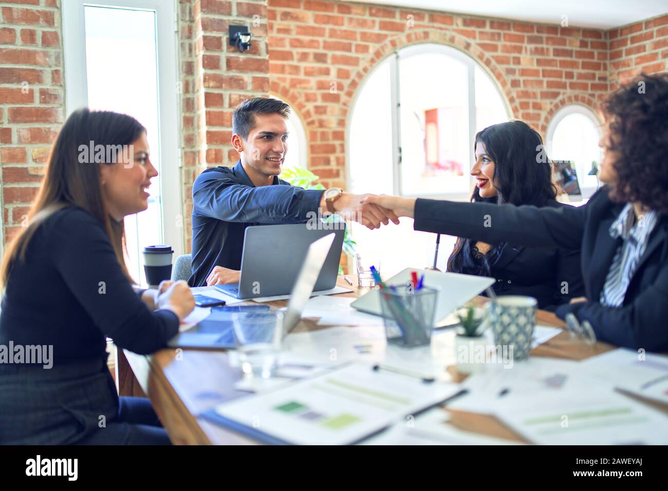 Group of business workers smiling happy and confident. Working together ...