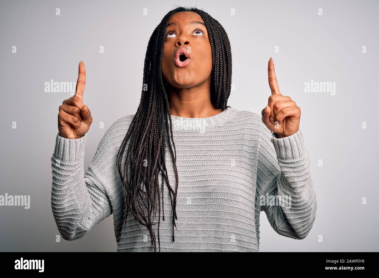 Young african american woman standing casual and cool over grey ...