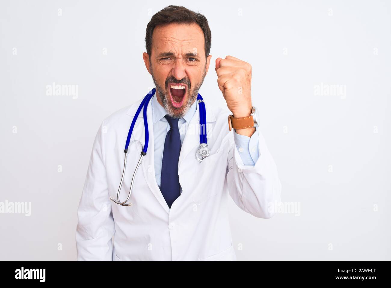 Middle age doctor man wearing coat and stethoscope standing over ...