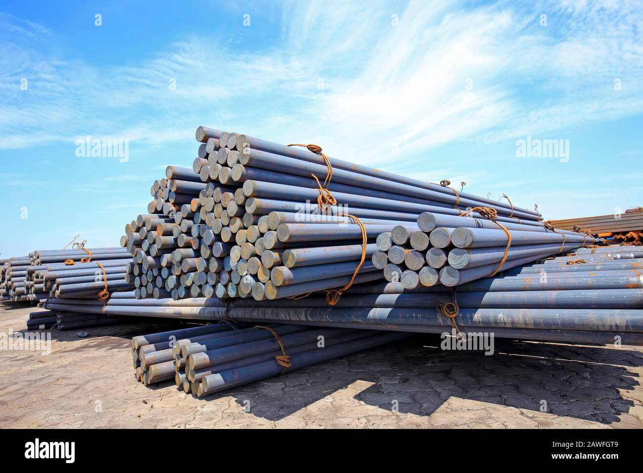 Stack of round steel bar Stock Photo - Alamy