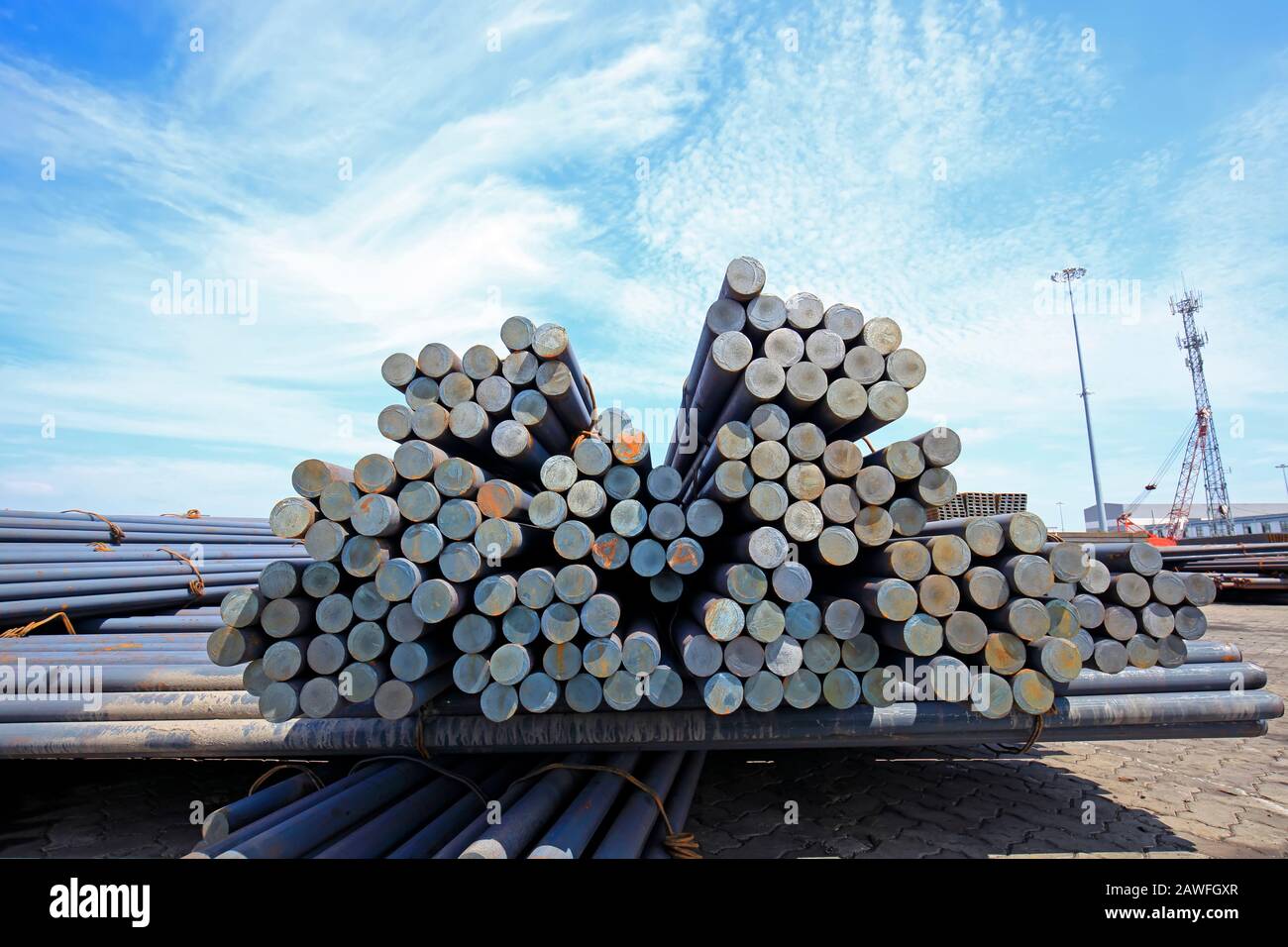 Stack of round steel bar Stock Photo - Alamy