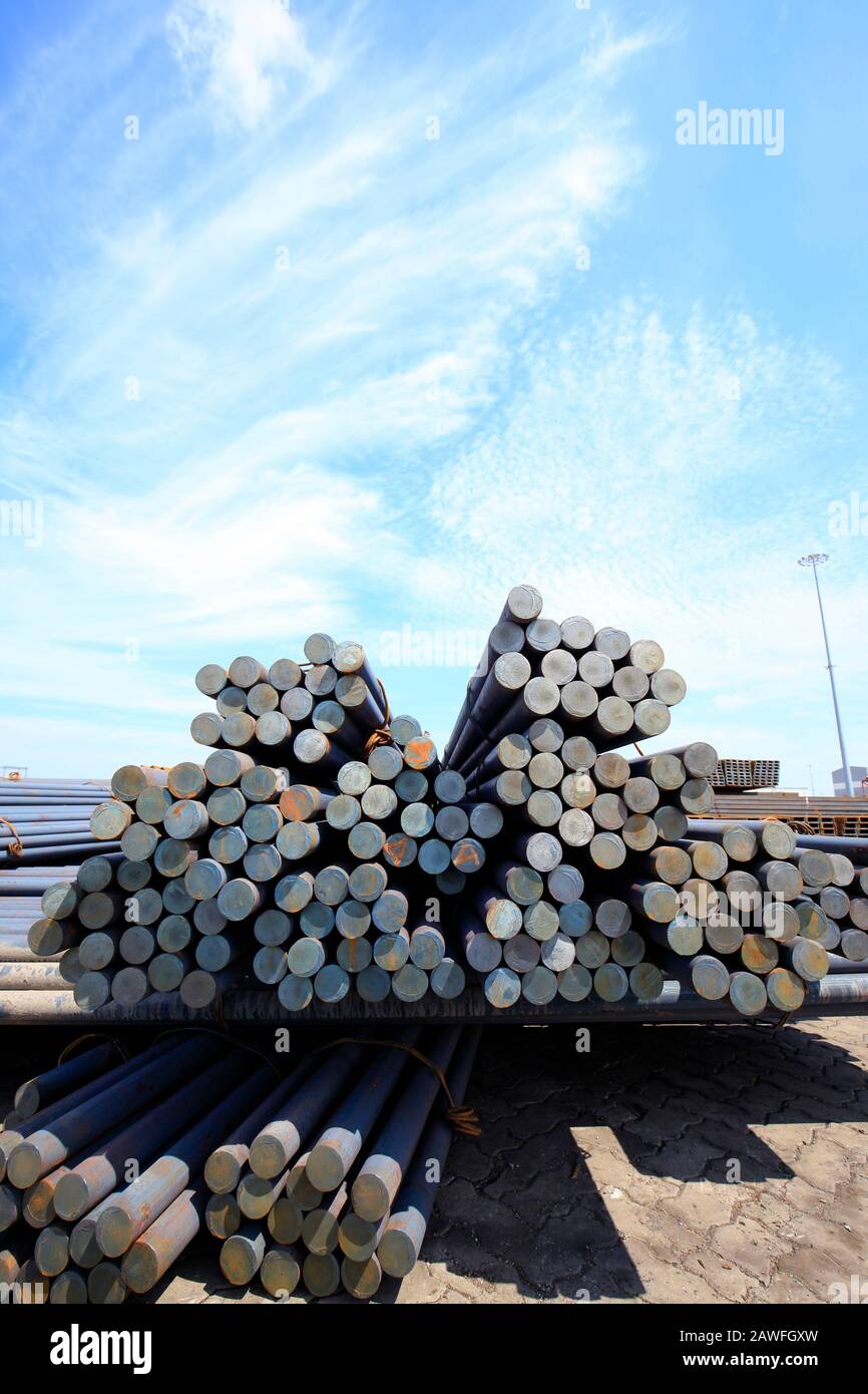 Stack of round steel bar Stock Photo - Alamy
