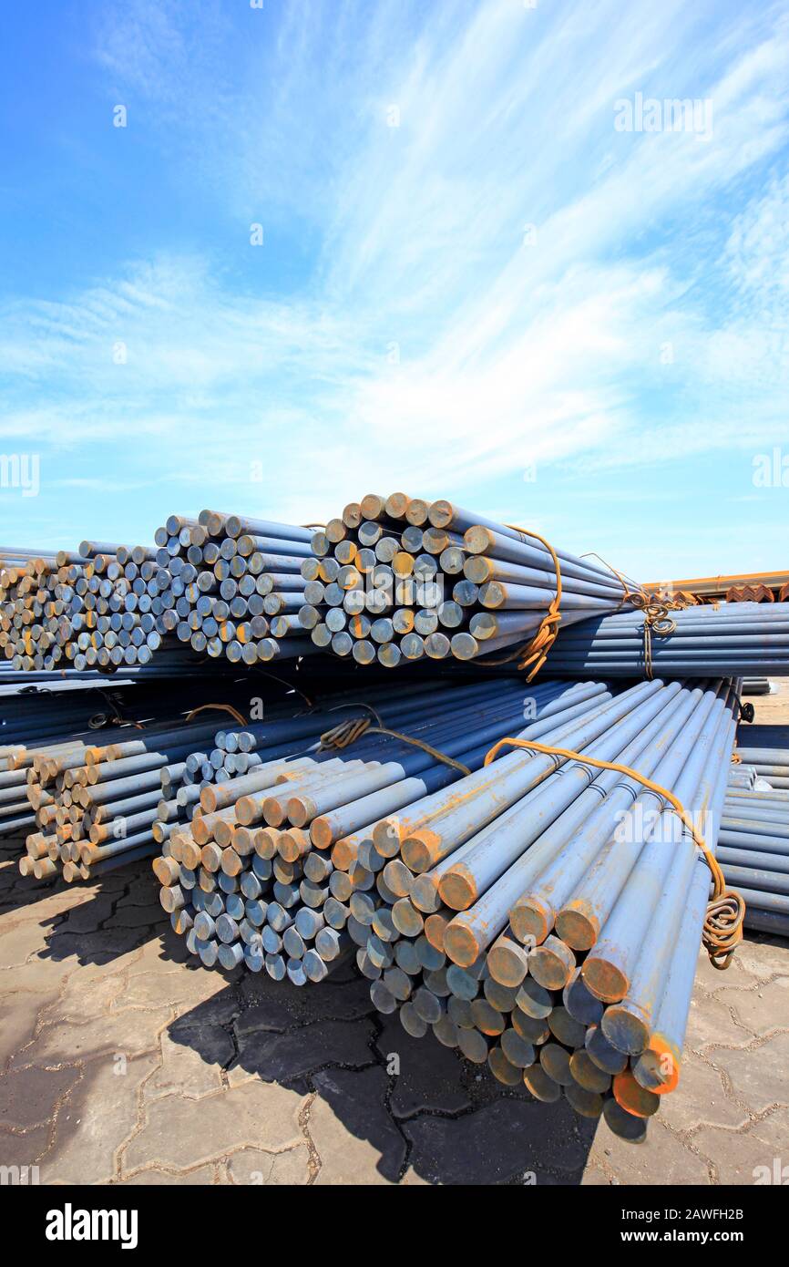 Stack of round steel bar Stock Photo - Alamy