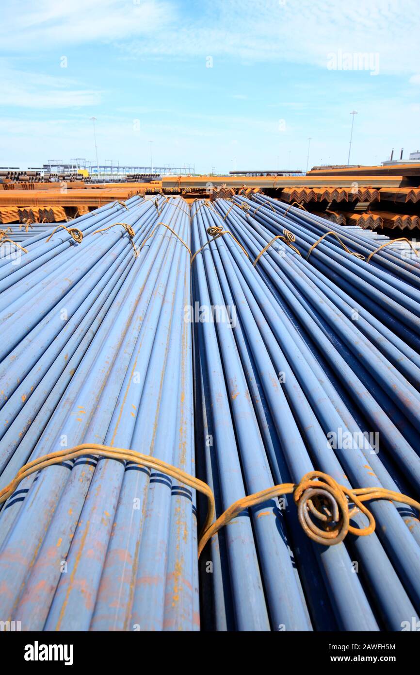 Stack of round steel bar Stock Photo - Alamy