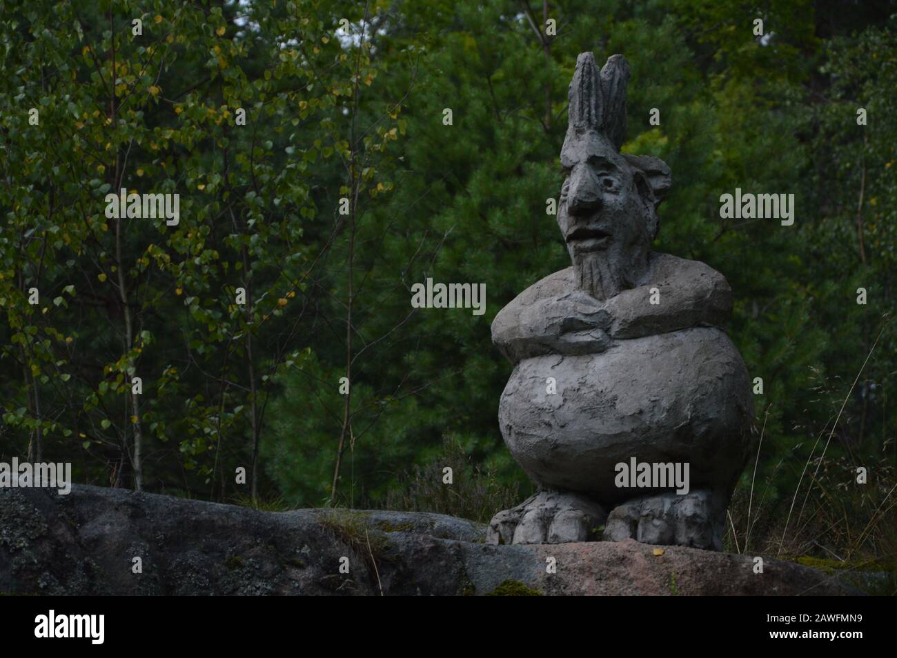 Forest, rock mountain, statue Stock Photo - Alamy