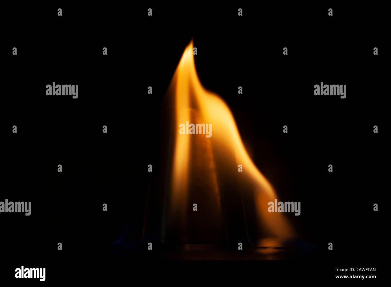 Alcohol burns on a stack for alcoholic drinks. Tongues of flame around ...