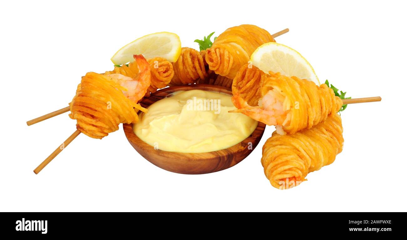 Potato string spiral wrapped king prawns on wooden skewers with a small ...