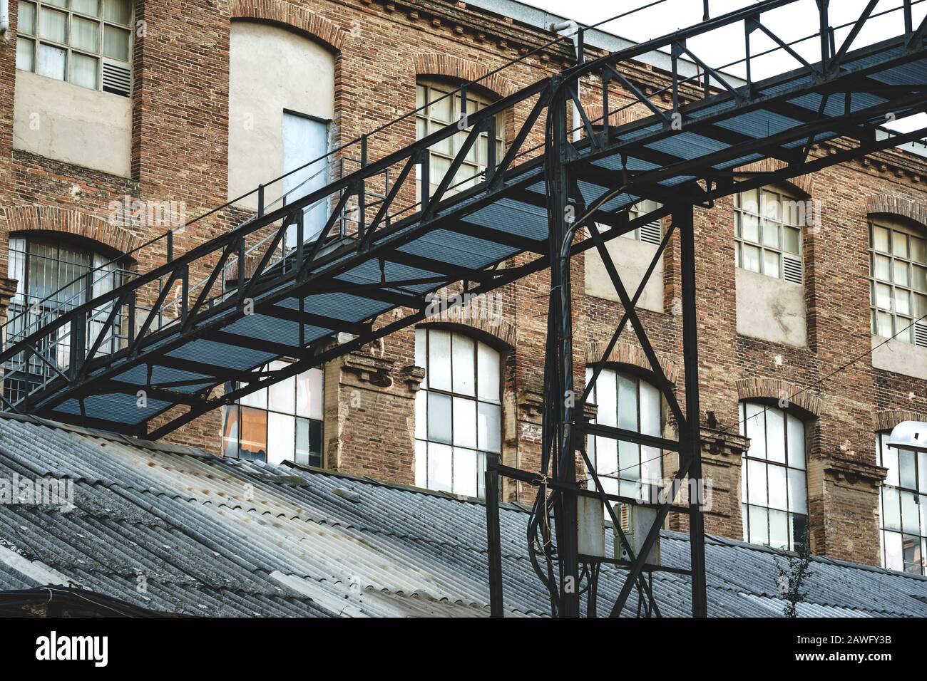 Iron bridge of an old textile factory Stock Photo - Alamy