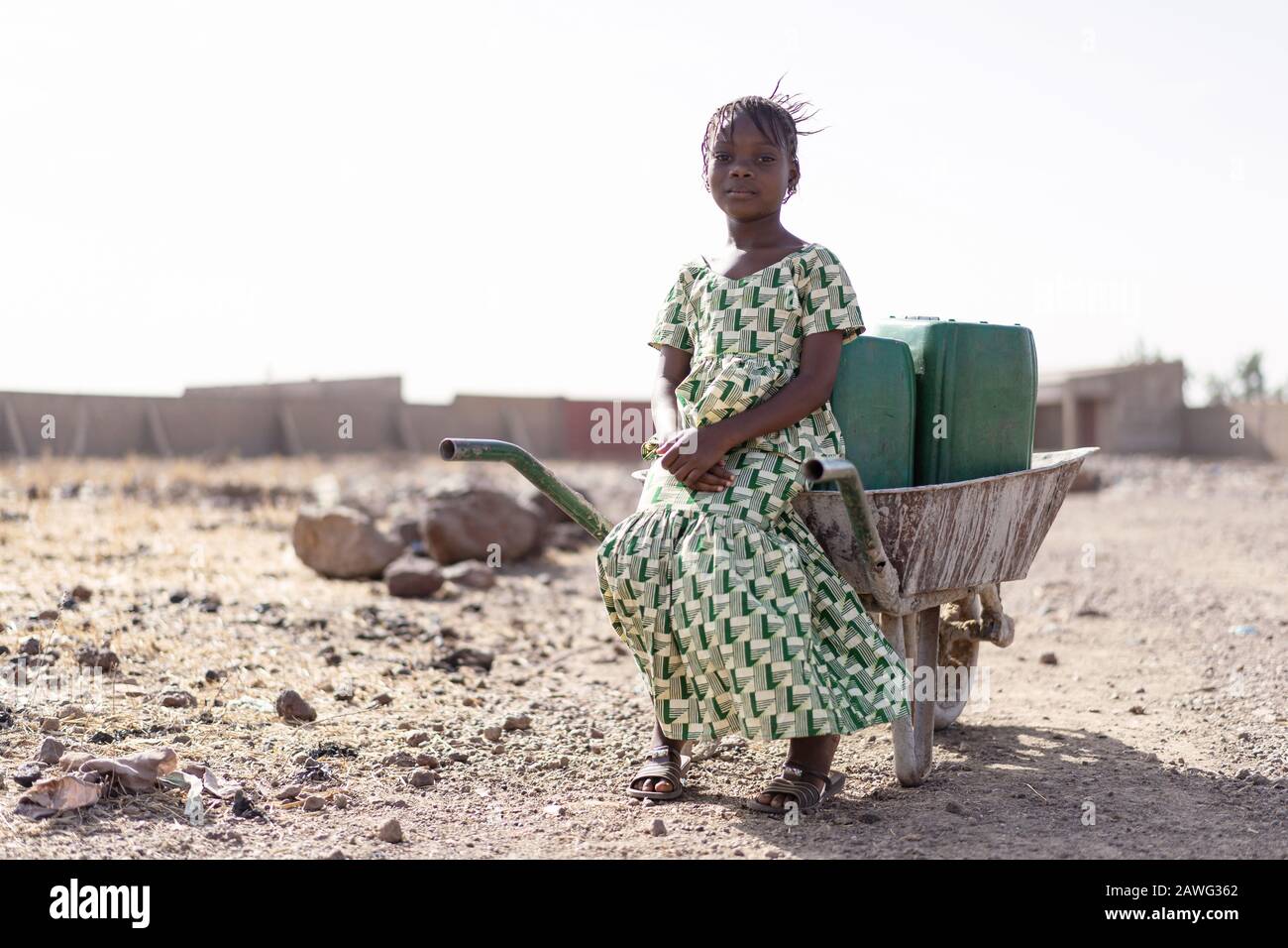 Young African Woman Gathering Fresh Water in a rural village Stock ...