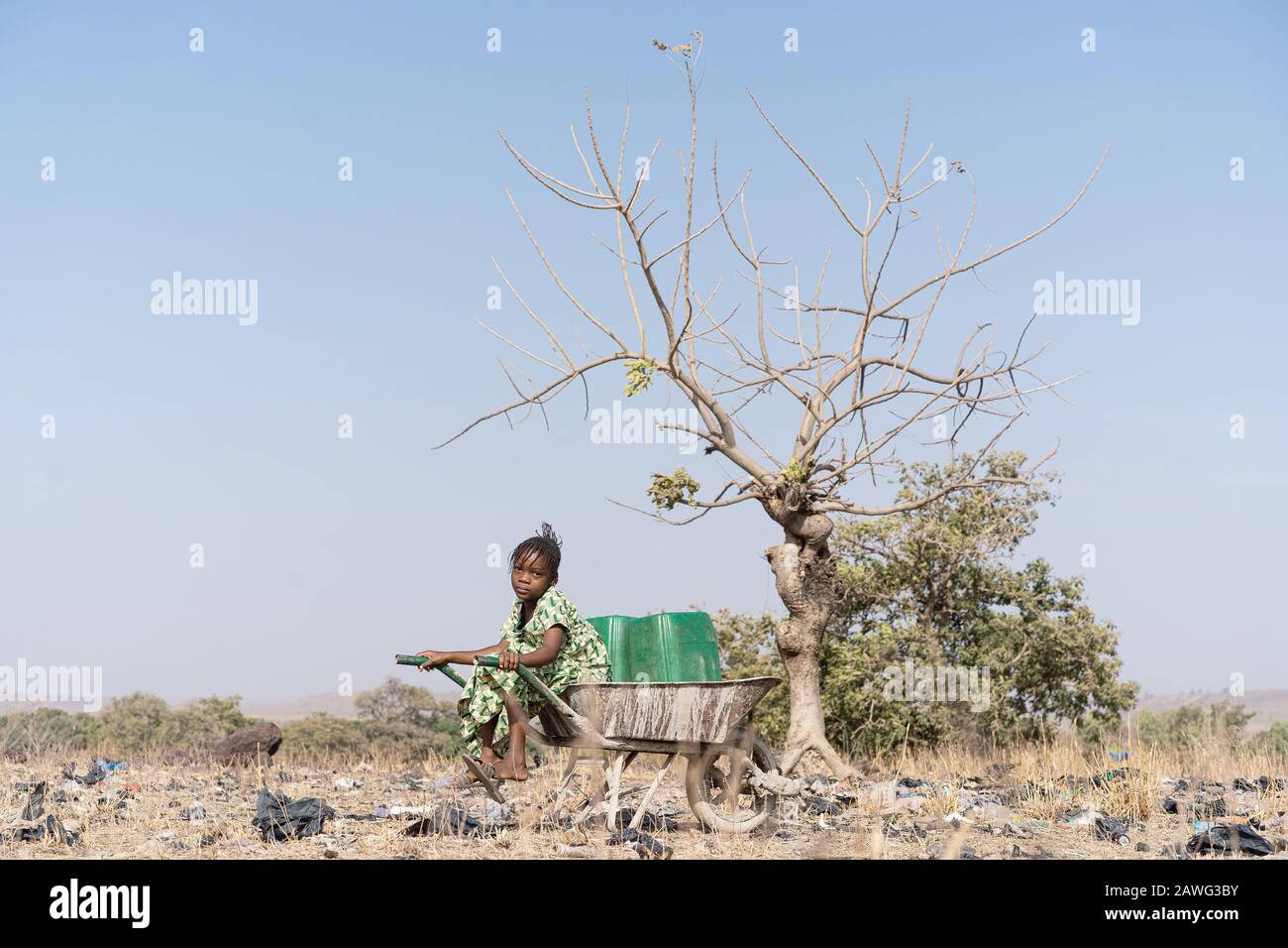 Beautiful Native African Woman getting nutritious Water in a natural ...