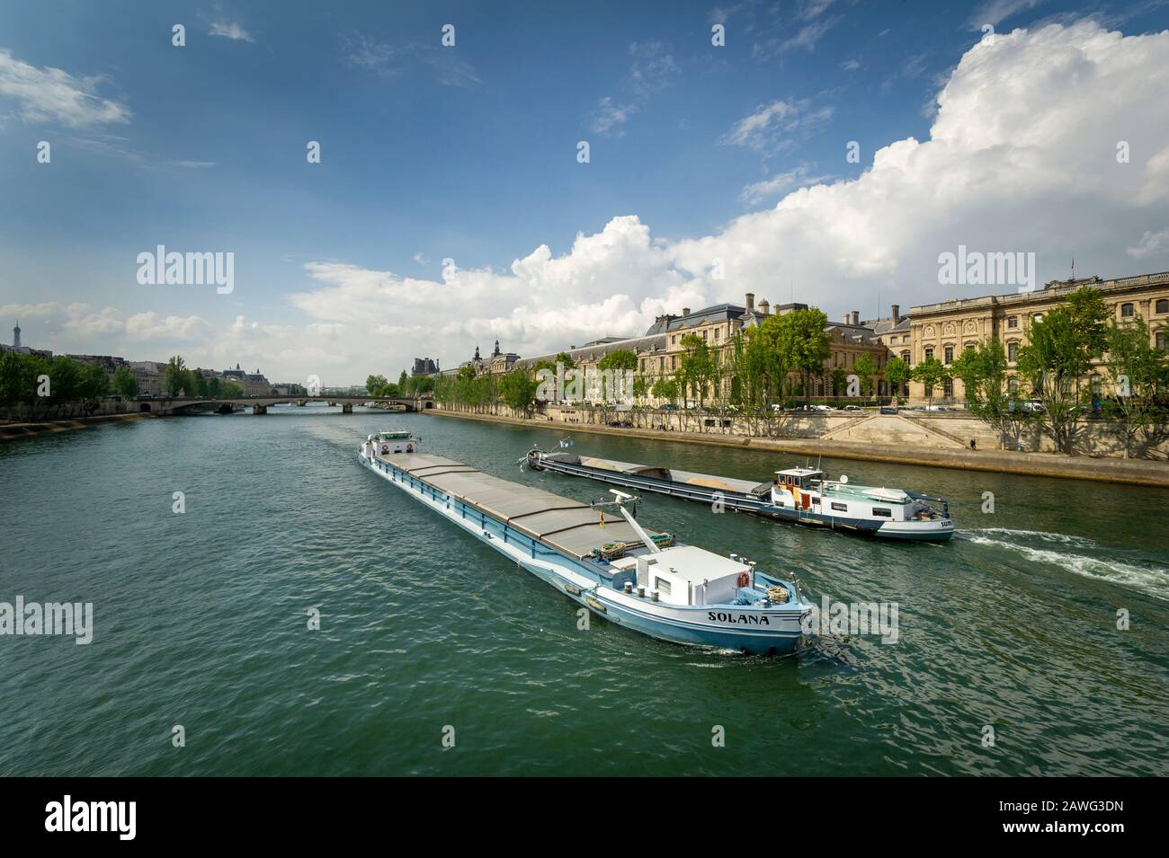 Barges on Seine river in Paris Stock Photo - Alamy