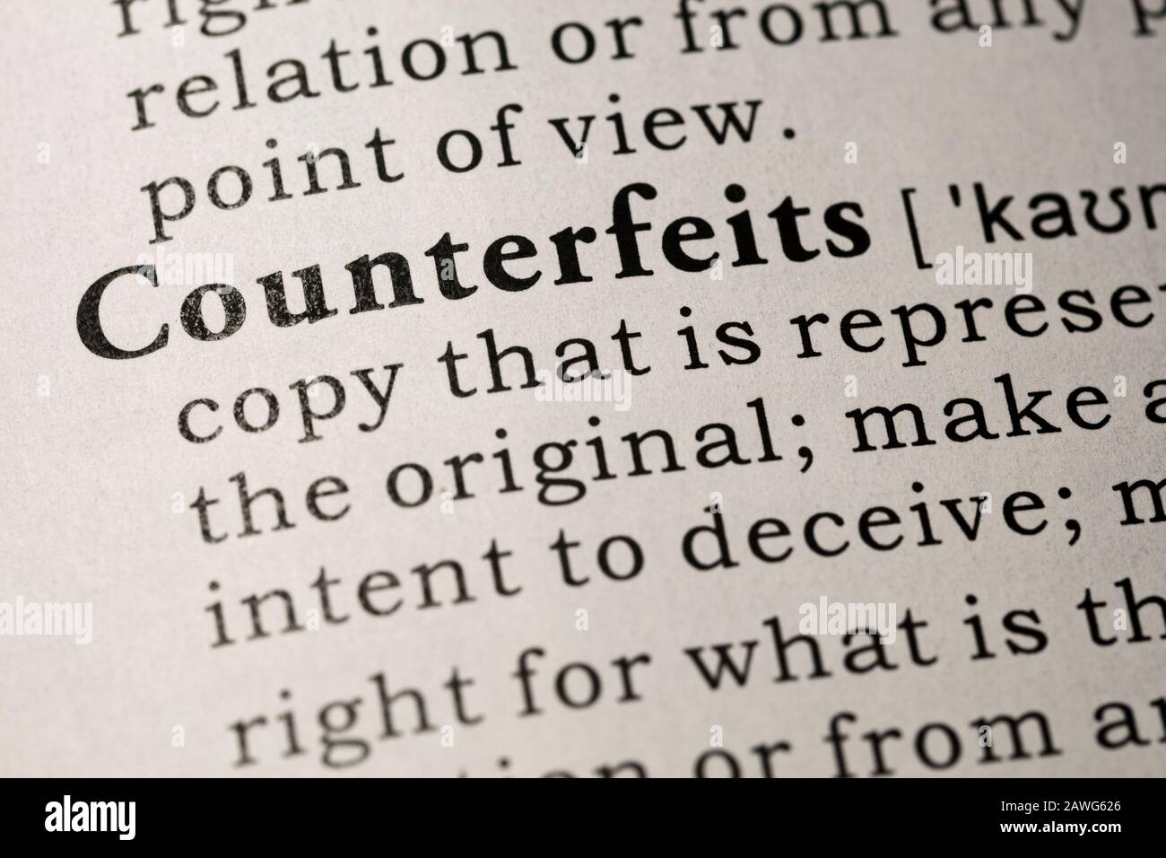 Fake Dictionary, Dictionary definition of counterfeits Stock Photo - Alamy