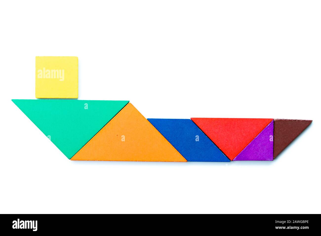 Color wood tangram puzzle in ship shape on white background Stock Photo ...