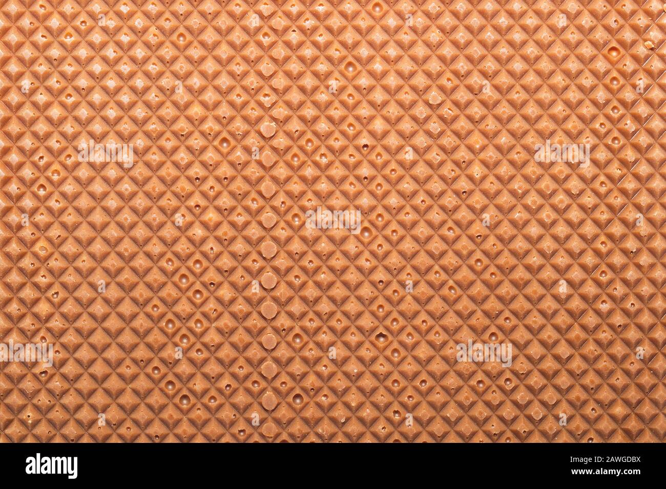 Chocolate bar macro texture. squared pattern Stock Photo - Alamy