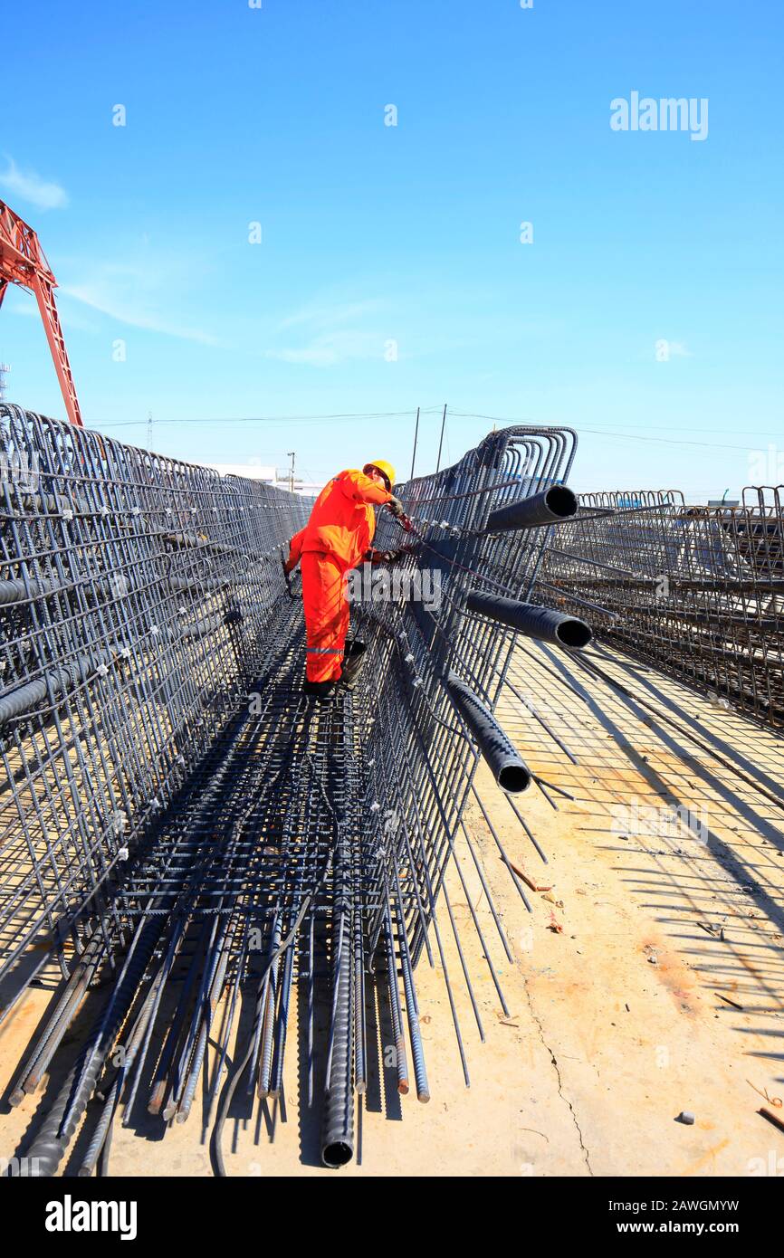 In the construction site, the welding workers at work Stock Photo - Alamy