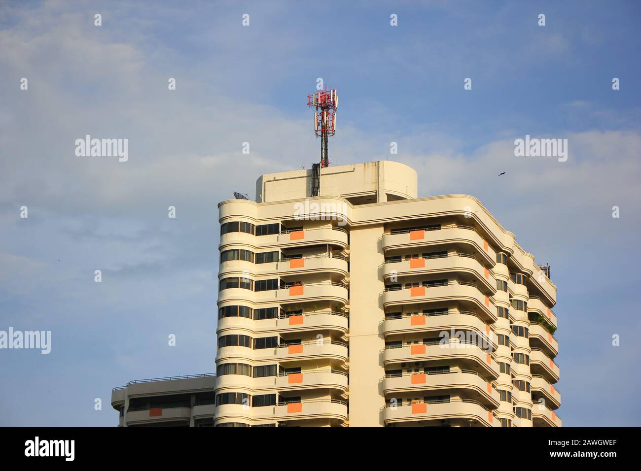 Mobile phone tower on building Stock Photo - Alamy