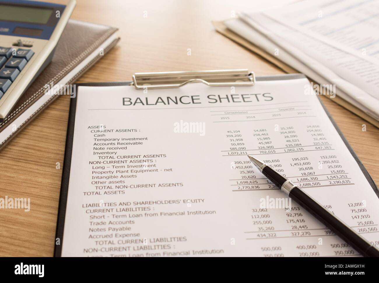 Balance sheet on desk's accountant hi-res stock photography and images ...