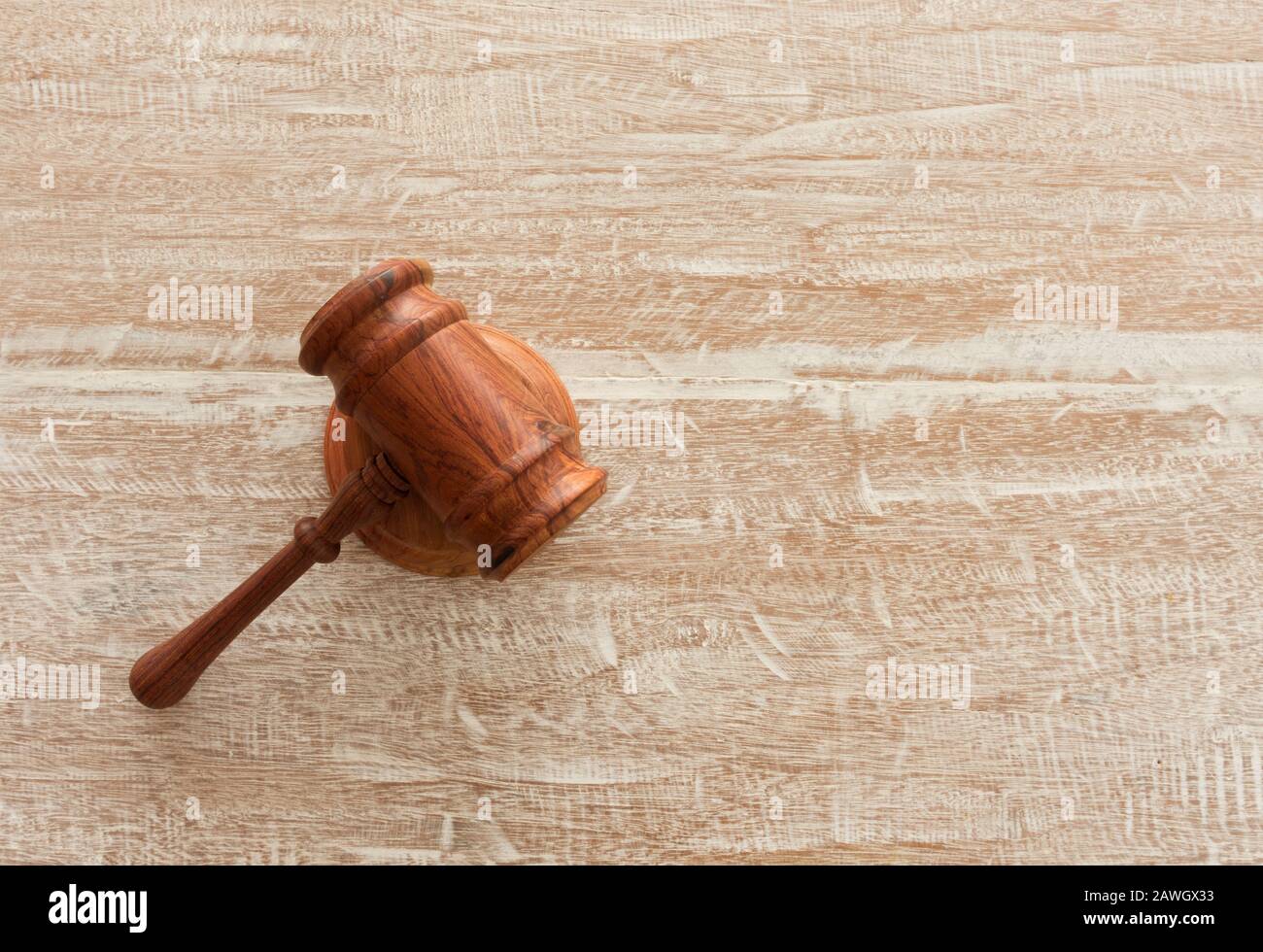 wooden judges gavel and soundboard resting on top of wooden desk Stock ...