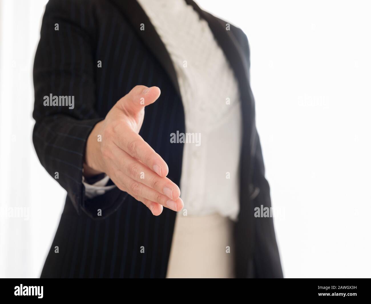 Working women giving her hand for handshake to partner. Concept of ...