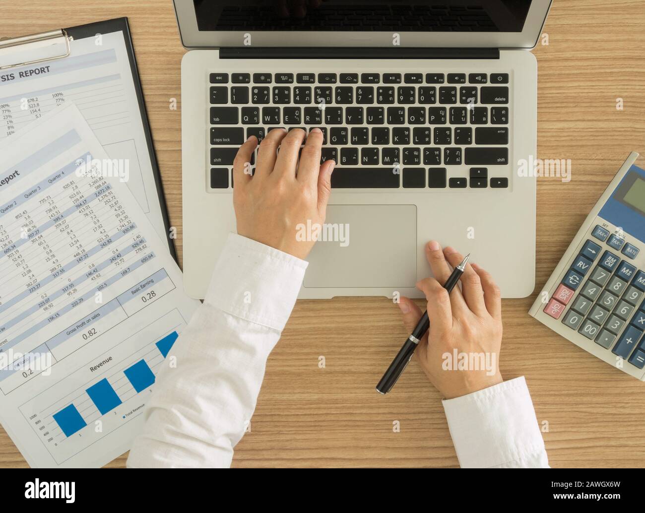 Accountants are saving the data into the computer Stock Photo - Alamy