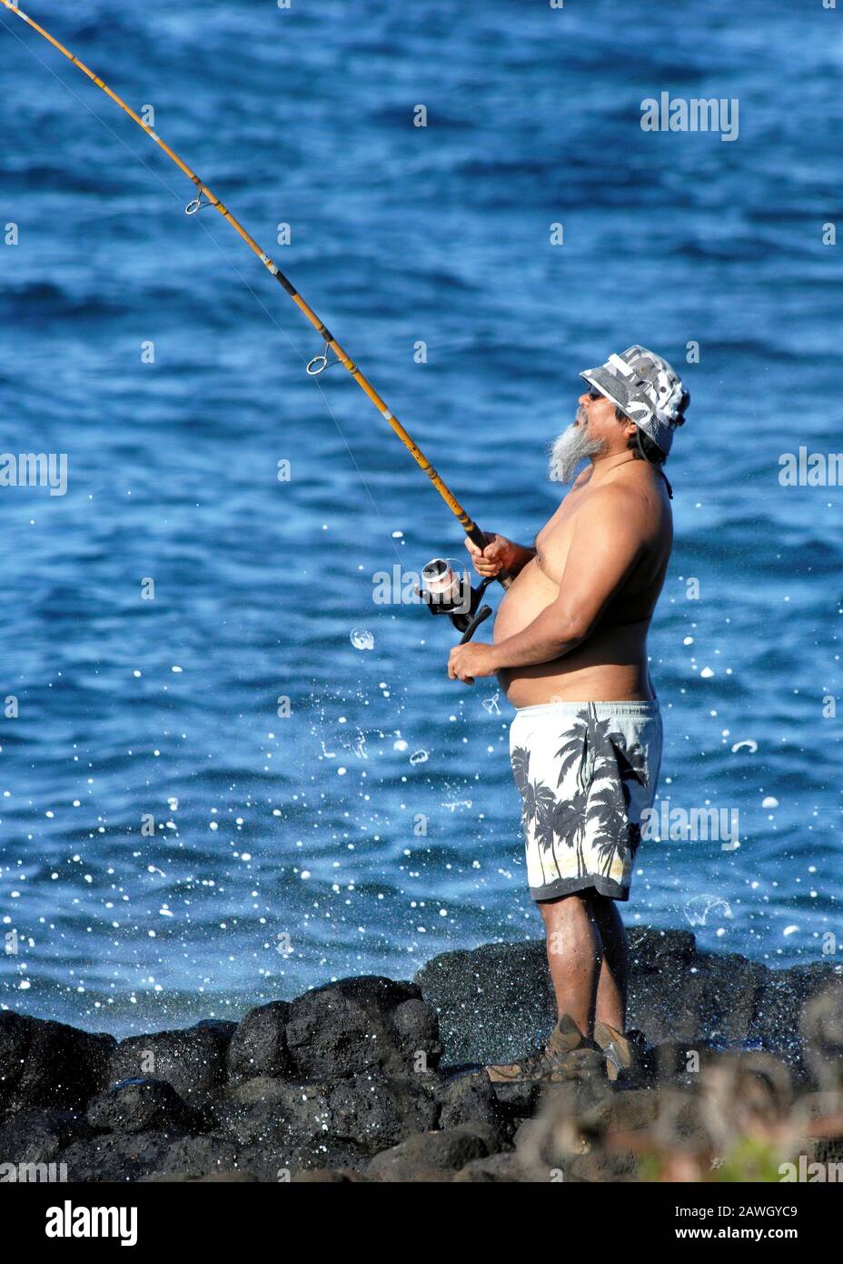 Surf fishing on beach in hawaii hi-res stock photography and images - Alamy