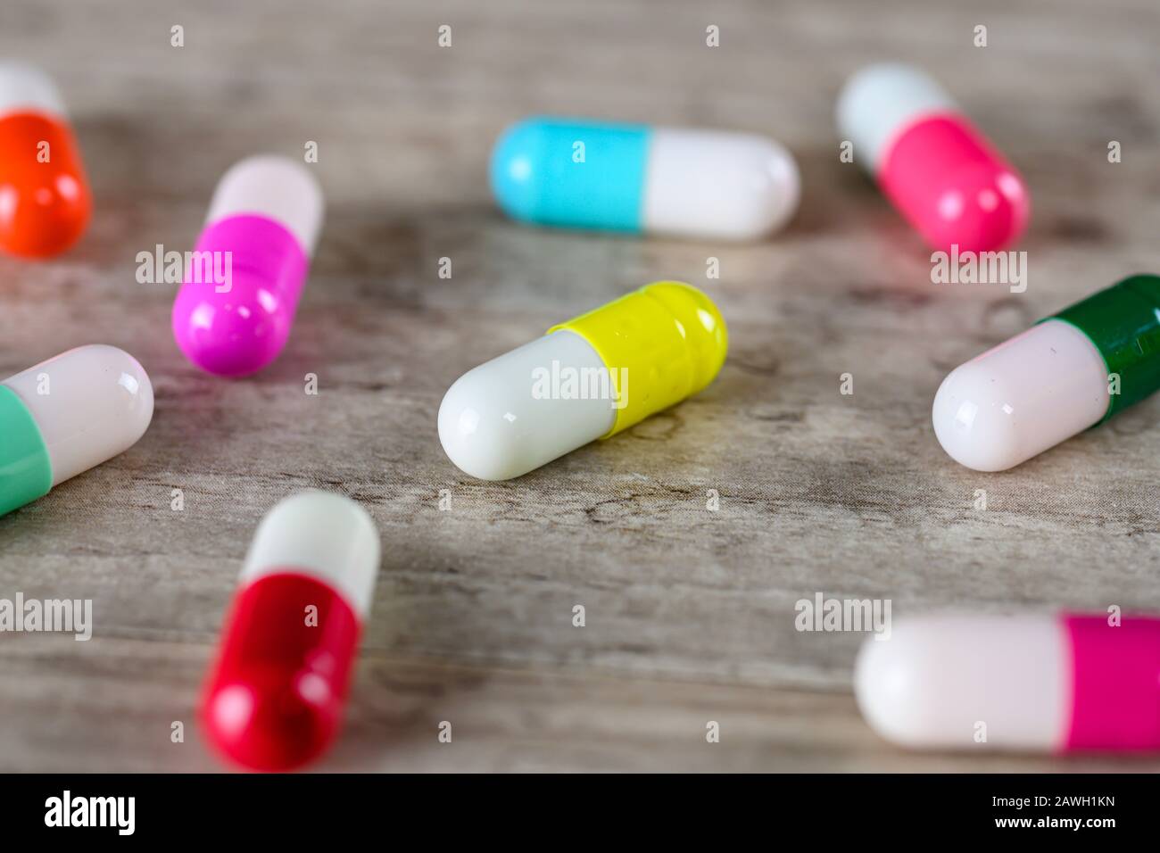 Colorful prescription pill capsules - medication on table Stock Photo ...