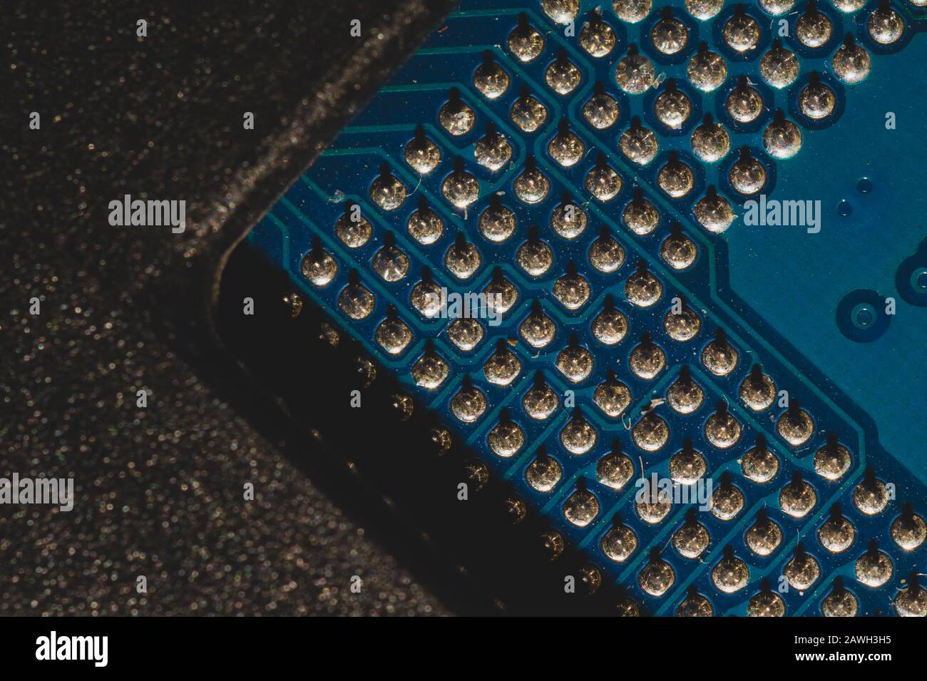 Processor pins macro. computer motherboard close up. cpu pins on a circuit board. micro elements ...