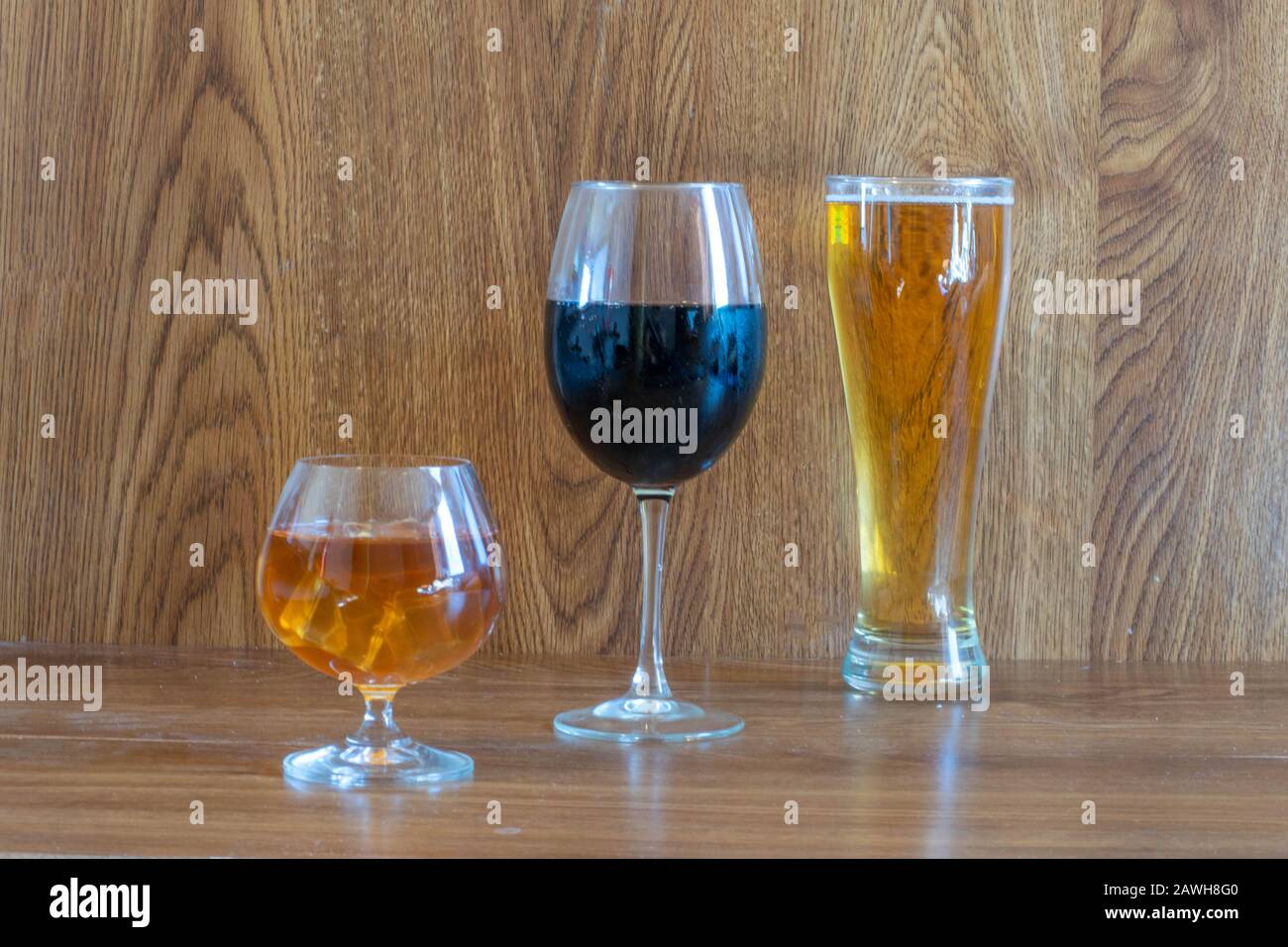 composition of alcoholic drinks with glass of whiskey, glass of clear ...