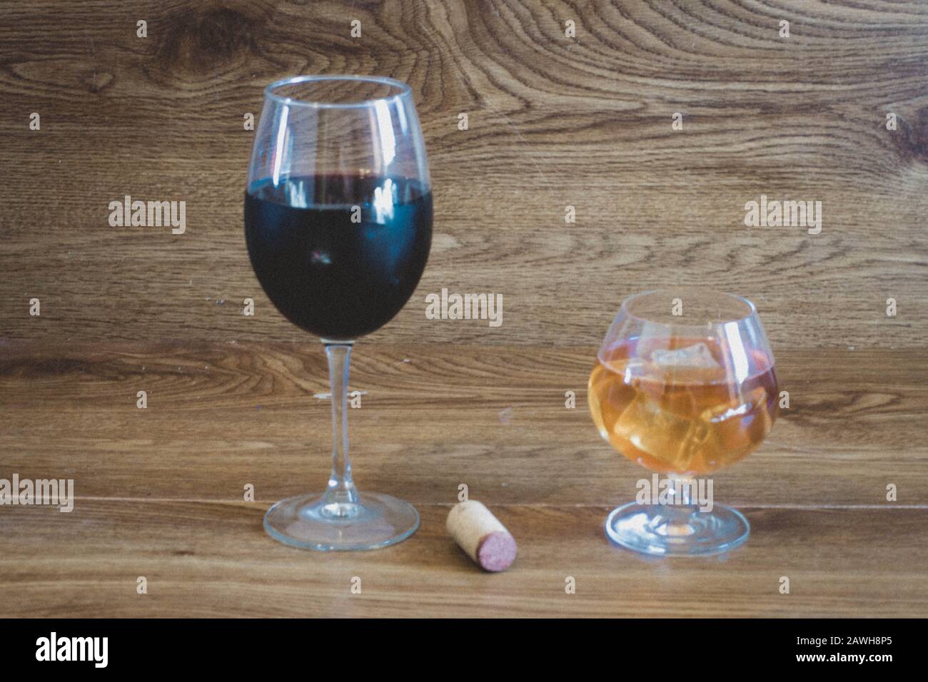 composition of alcoholic drinks with glass of whiskey and glass of red ...