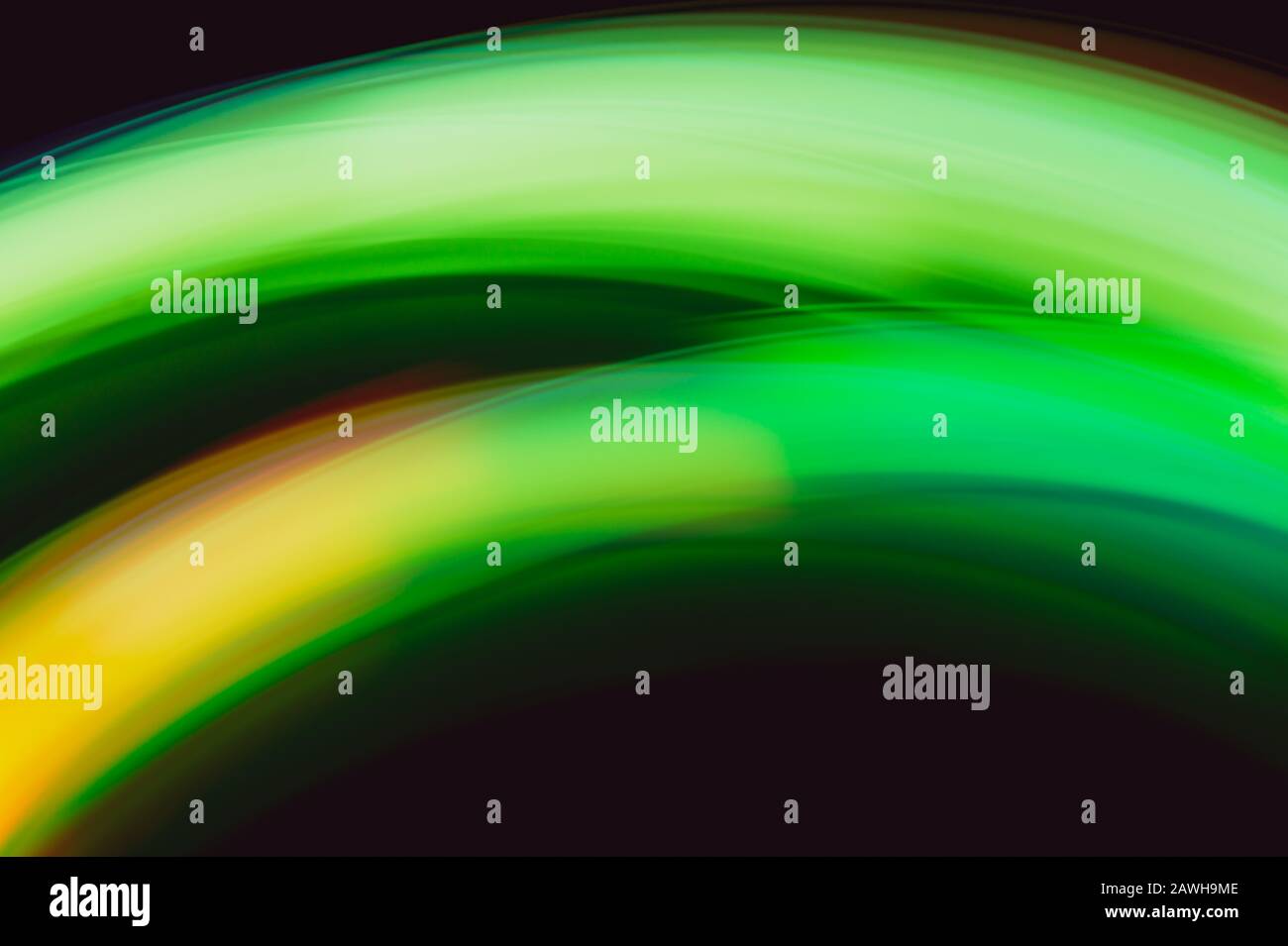 Colorful light traces with long exposure in the dark. abstract blurred ...