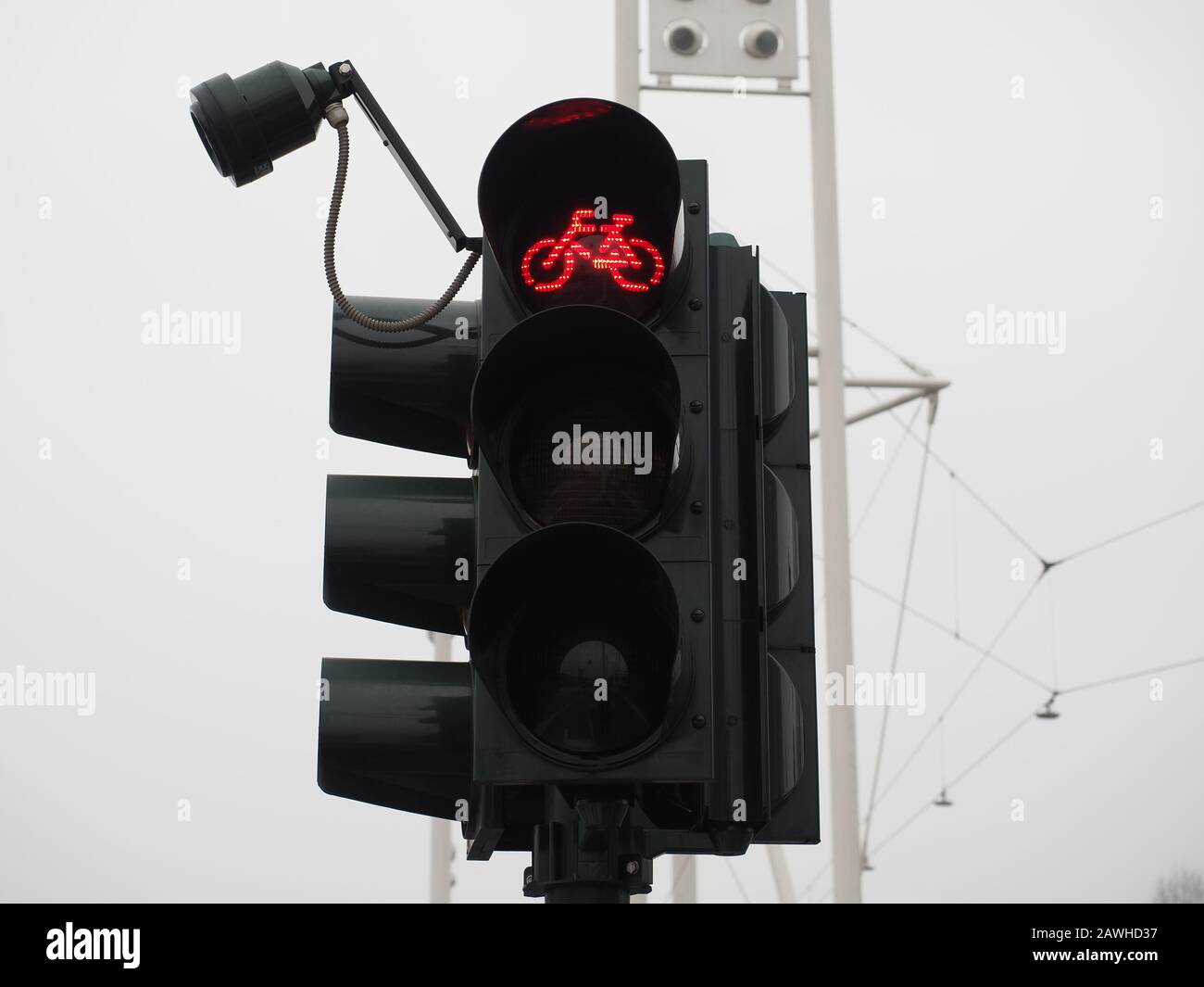 Traffic signal with red light meaning stop for bikes Stock Photo - Alamy