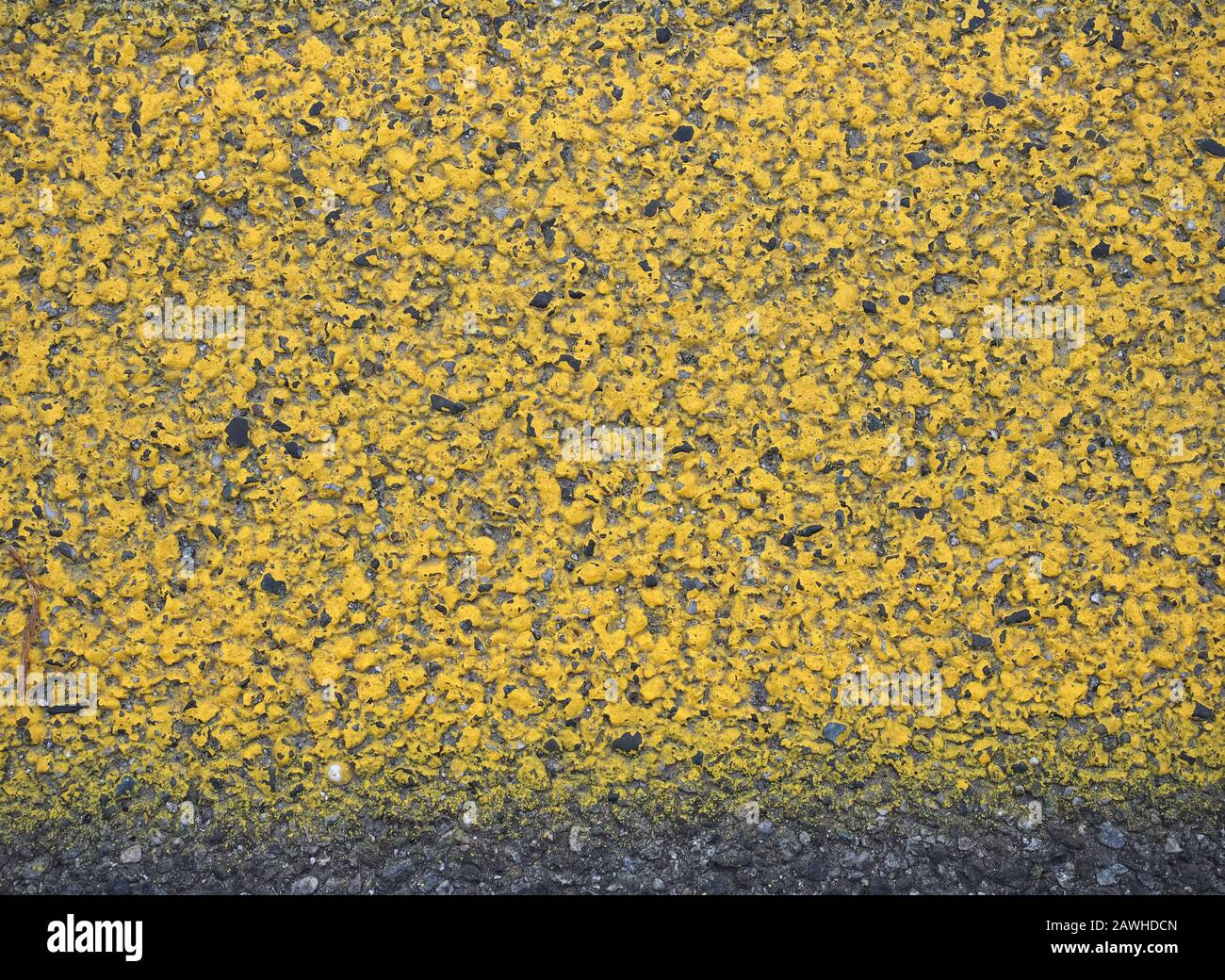 yellow tarmac texture useful as a background Stock Photo - Alamy