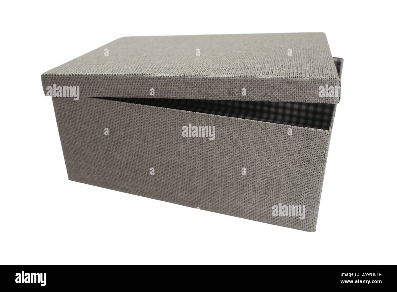 Cardboard box with a slightly opened lid isolated on white Stock Photo ...