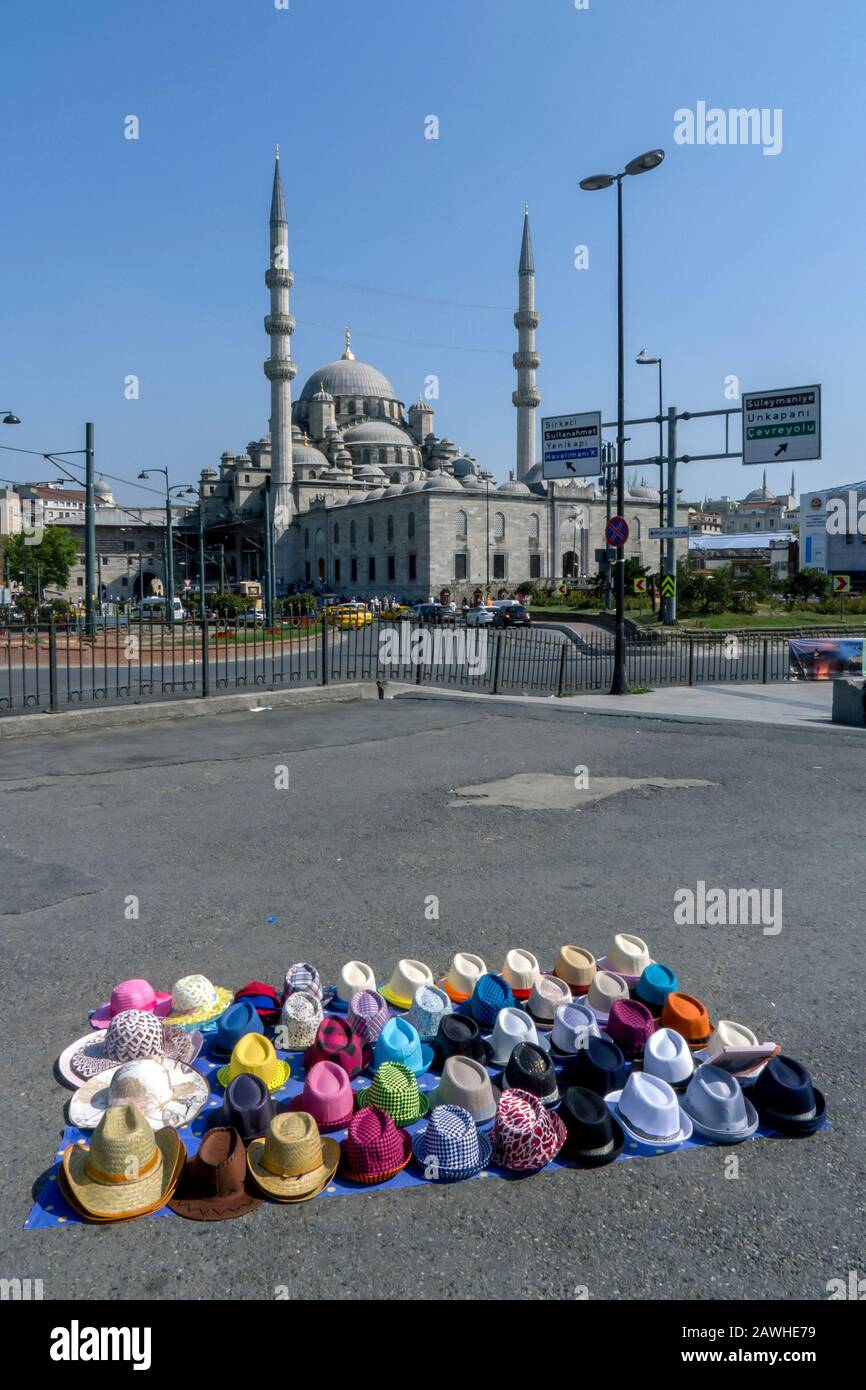 Colourful hats for sale on the footpath in the suburb of Sirkeci in ...