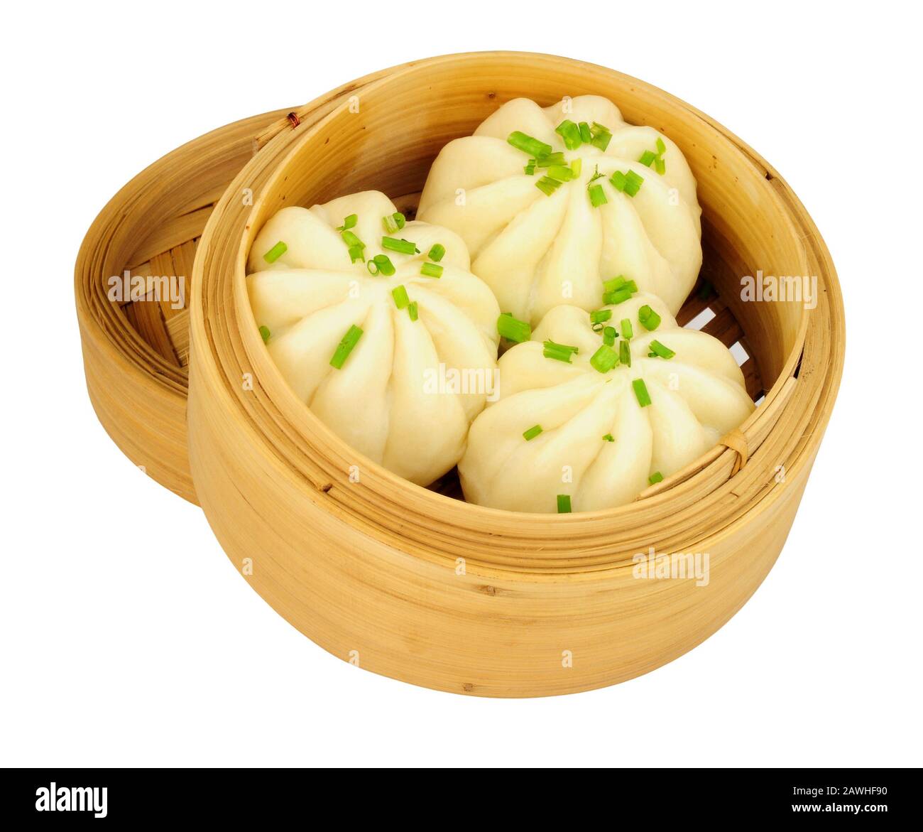 Steamed bao buns in bamboo steamers isolated on a white background ...