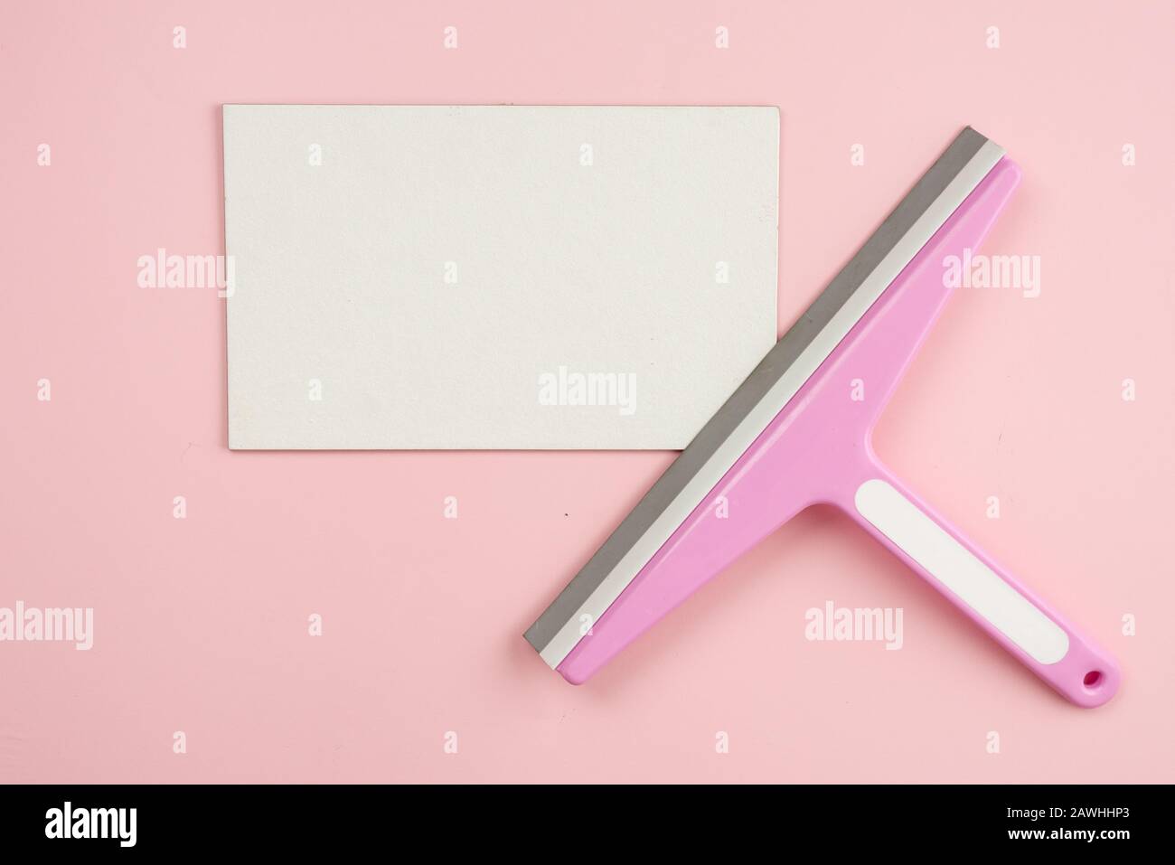 Window brush lying on empty white mockup on pink background. Concept ...