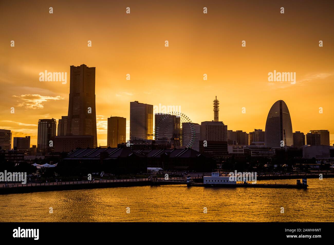 Yokohama skyline at sunset Stock Photo - Alamy