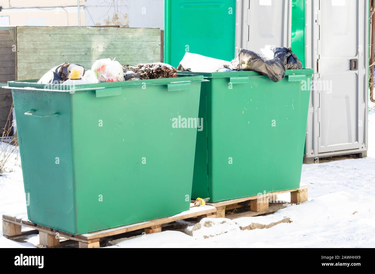 Green containers filled with garbage. Environmental pollution Stock ...
