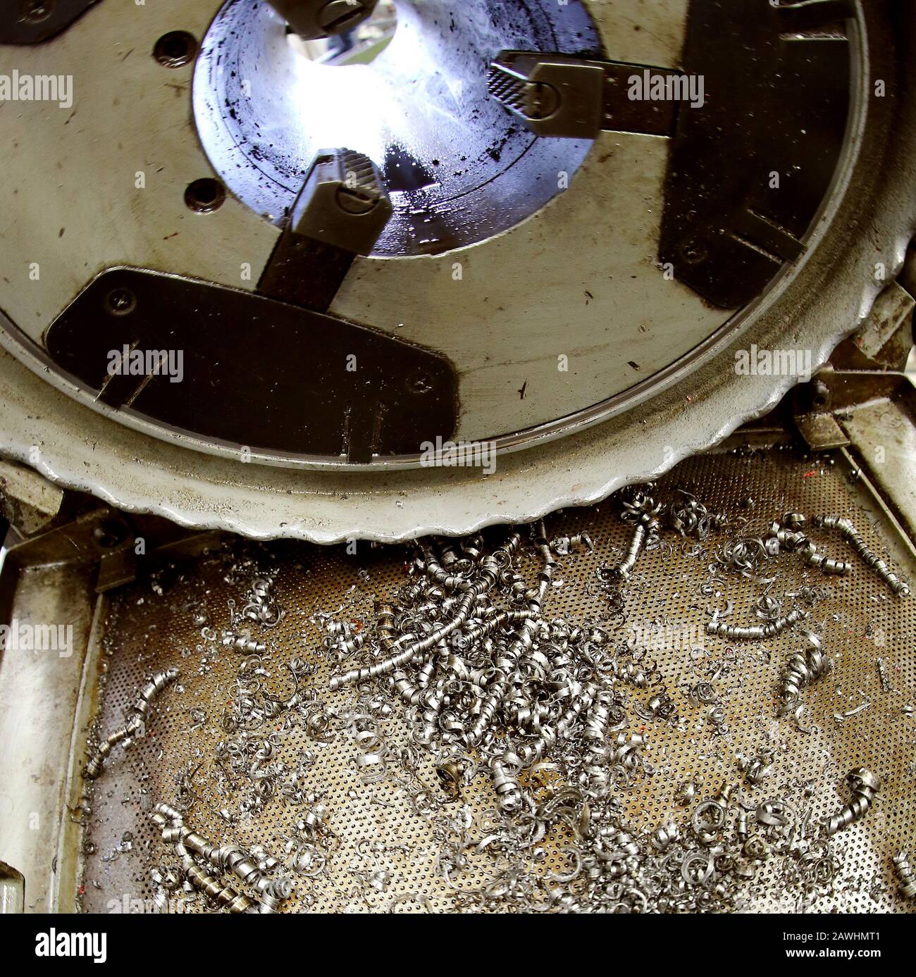 Machine for processing iron and metal shavings Stock Photo - Alamy