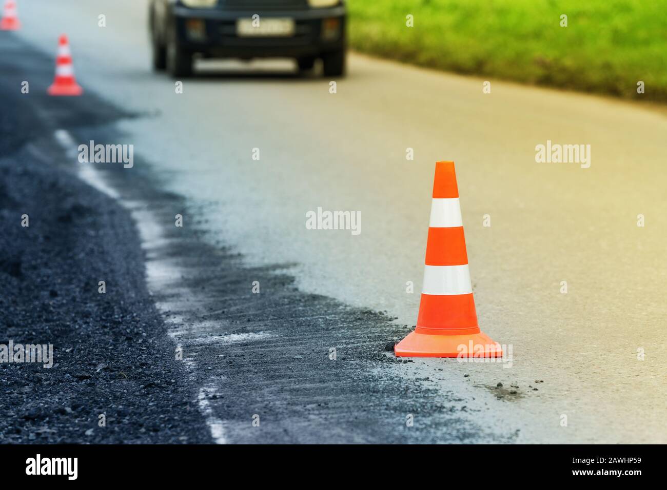 Warning traffic road cone set on asphalt street road during road ...