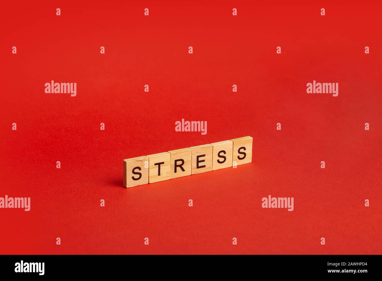 Stress concept. Stress on a red empty background. A feeling of anxiety ...