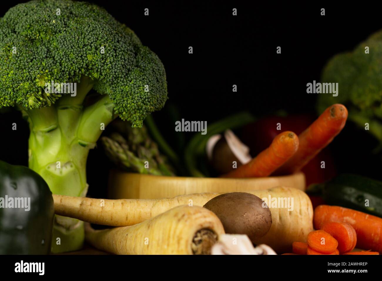 Group of vegetables on a black background. Concept for healthy ...