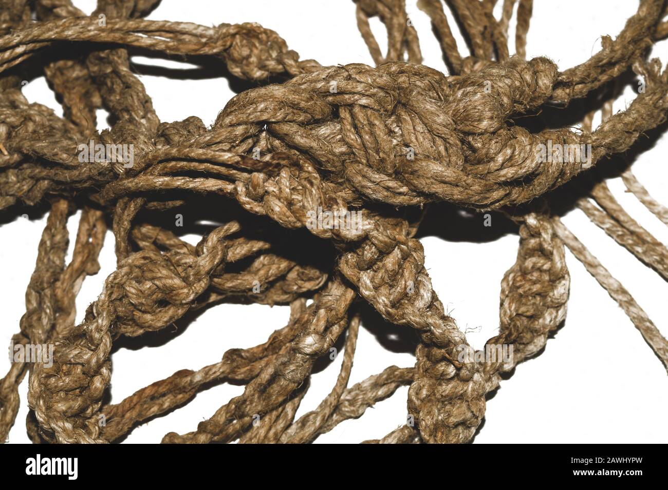 Tangled rope on a white background Stock Photo - Alamy